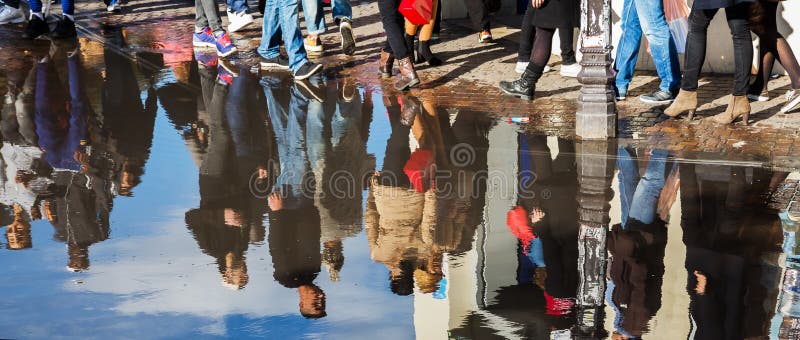 Crowd of People Reflecting in a Puddle Editorial Image - Image of crowd ...