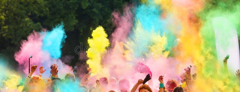 Crowd Throwing Bright Coloured Powder Paint In The Air Stock Image ...