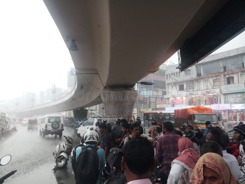 Crowd, Rain, Under the Bridge Editorial Photography - Image of crowd ...