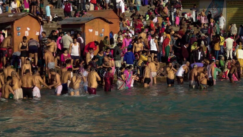 A Crowd of Religious are Taking a Holy Bath in the Sacred Waters of the ...