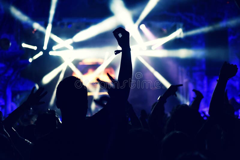 Raised Arms Holding Smart Phones To Recording a Live Concert Stock ...