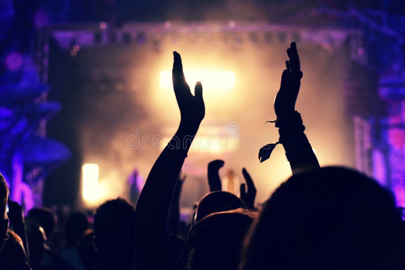 Crowd Rocking during a Concert with Raised Arms. Stock Photo - Image of ...