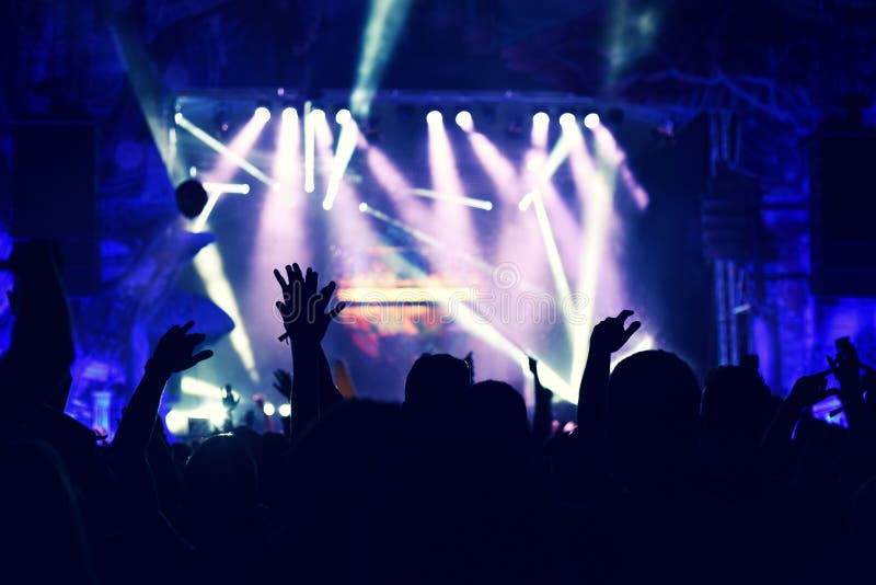Crowd Rocking during a Concert with Raised Arms. Stock Photo - Image of ...
