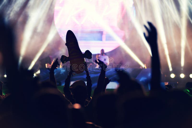 Crowd Rocking during a Concert with Raised Arms. Stock Photo - Image of ...
