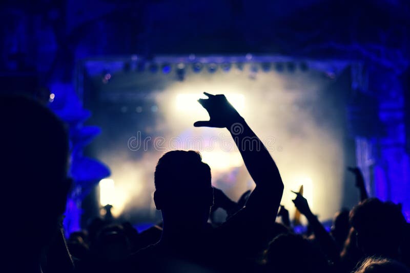 Crowd Rocking during a Concert with Raised Arms. Stock Image - Image of ...