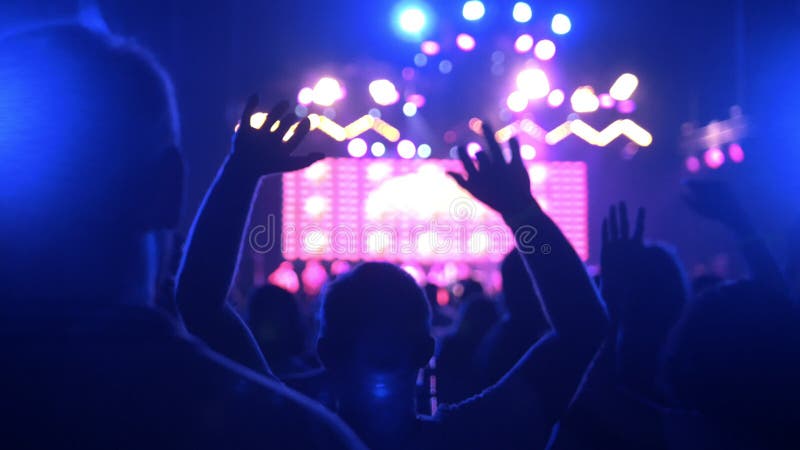The Crowd of Shadows of People Dancing at the Concert Stock Footage ...