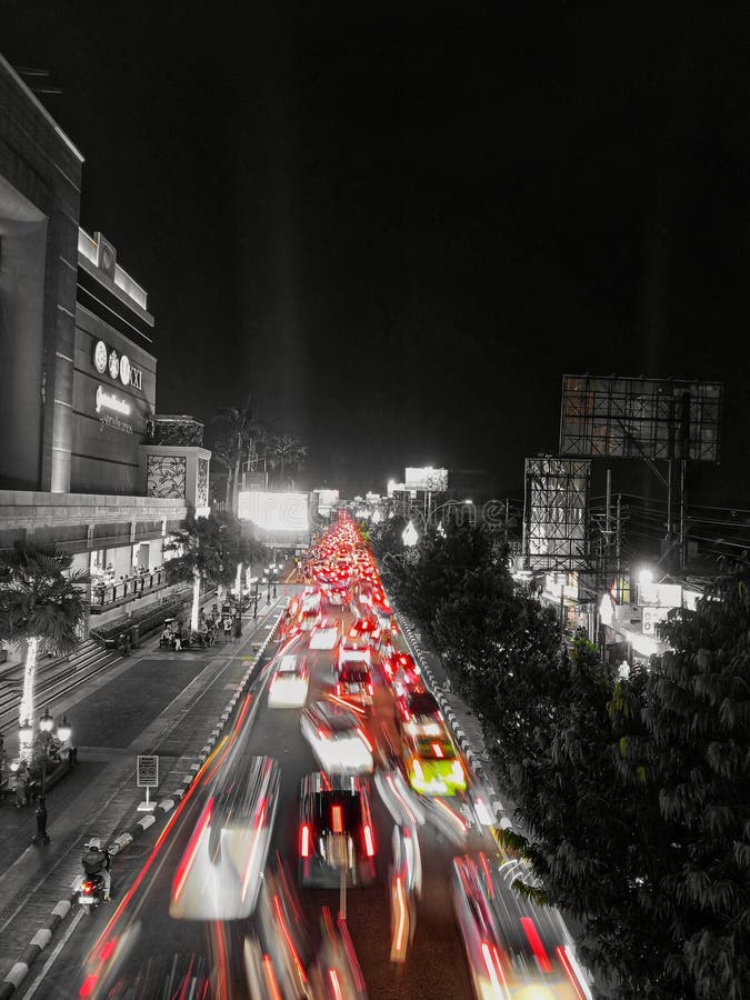The Crowd of Vehicles Passing by on the Highway at Night at a Safe ...