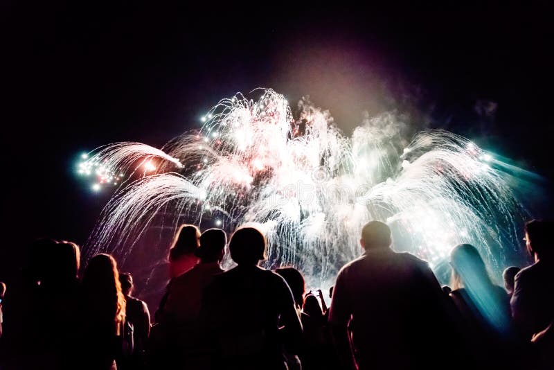 Crowd Watching Fireworks and Celebrating New Year Eve Stock Photo ...