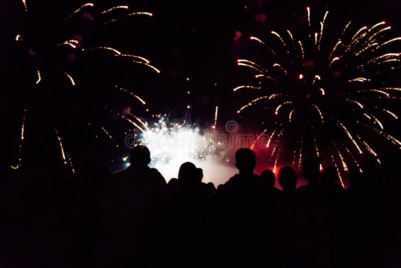 Crowd Watching Fireworks and Celebrating New Year Eve Stock Photo ...