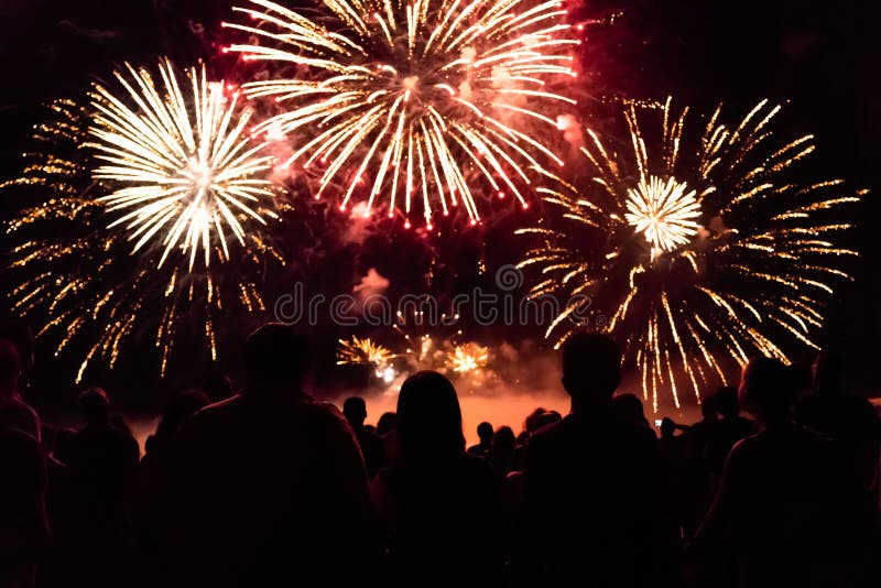 Crowd Watching Fireworks and Celebrating New Year Eve Stock Photo ...
