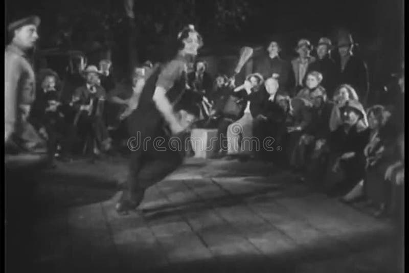 People are Dancing Disco on a Disco Field Glowing with Colorful Squares ...