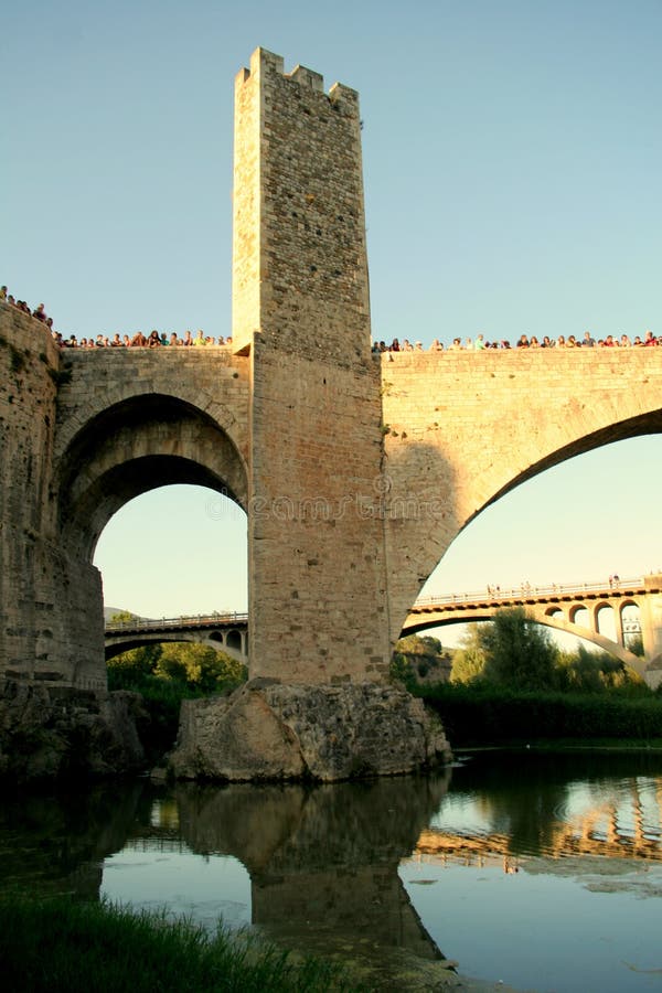 Crowded Ancient Bridge Over a River Stock Photo - Image of reflection ...