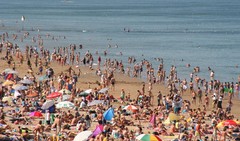 Crowded Beach in Summer editorial stock photo. Image of population ...