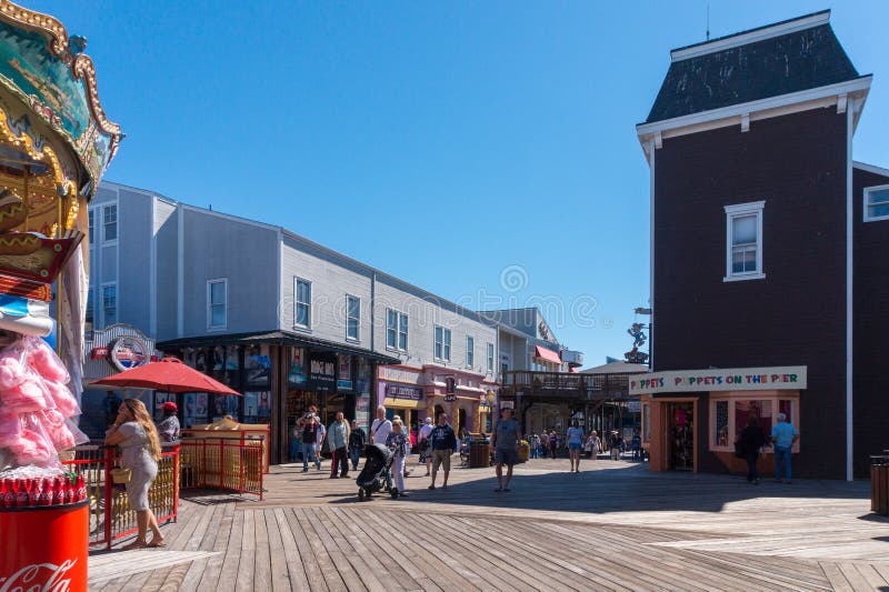 Walking on a Pier 39 area editorial photography. Image of embarcadero ...