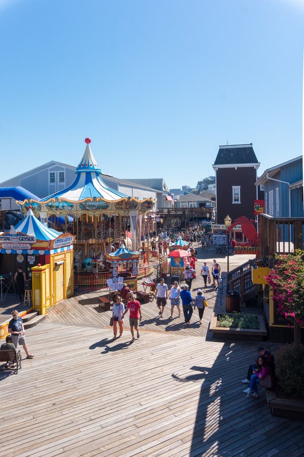 Walking on a Pier 39 area editorial photo. Image of architecture - 99363741