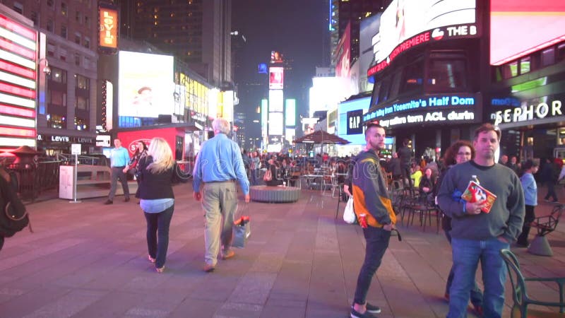 Crowded Times Square at Night Tourists, People, Sidewalk Stock Footage ...