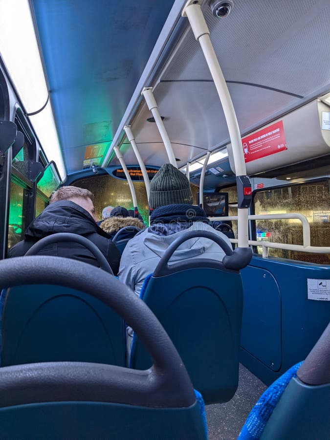 A Crowded Upper Floor Full of Passengers with Handrails, Stop Buttons ...