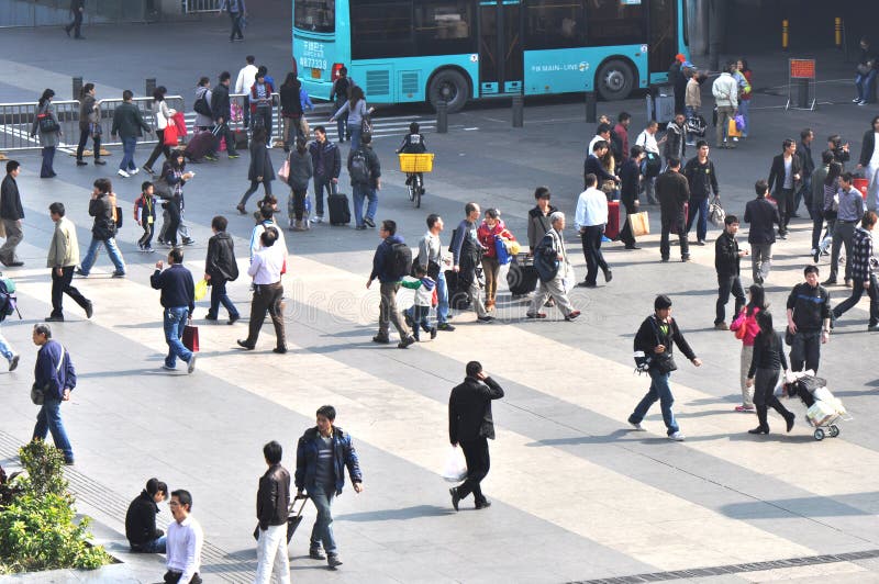 Crowds at bus station editorial stock image. Image of carry - 22633594