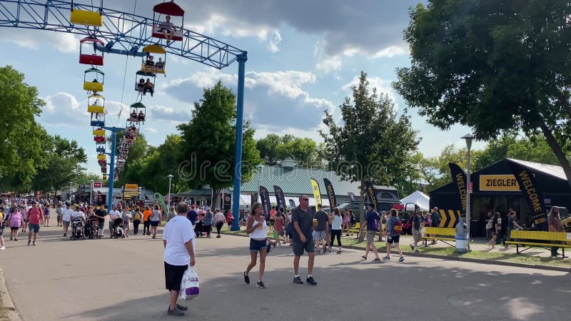 Crowds of People Walk Around the Minnesota State Fair. Stock Video ...