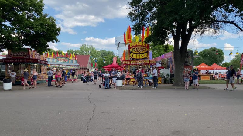 Crowds of People Walk Around the Minnesota State Fair. Stock Video ...