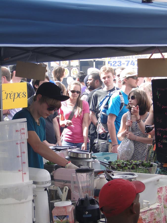 Crowds sample the food editorial stock photo. Image of ethnic - 15967158