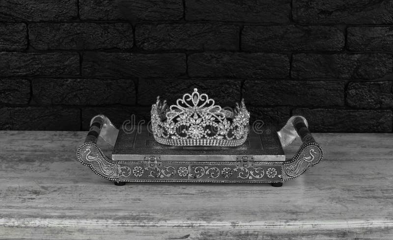 Crown on a box, black stock image. Image of vintage - 296171857