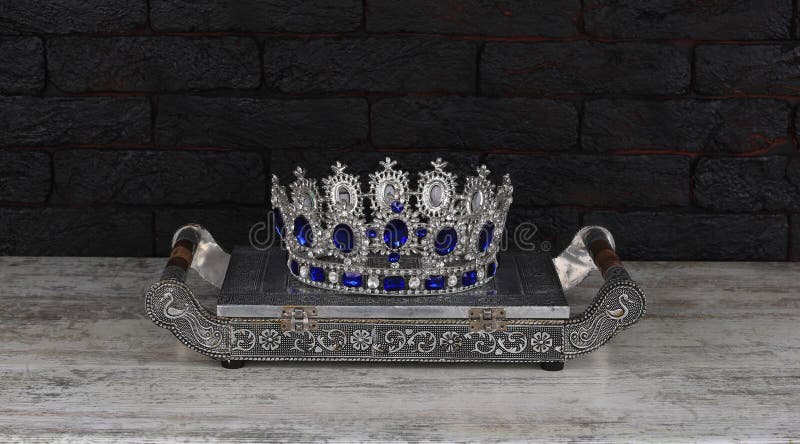 Crown on a box, black stock photo. Image of decoration - 296171972