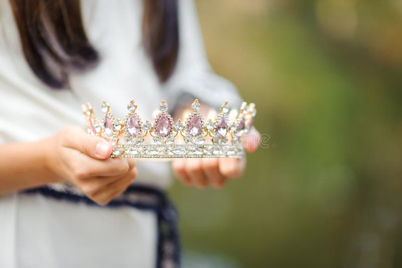 787 Girl Holding Crown Hands Stock Photos - Free & Royalty-Free Stock ...