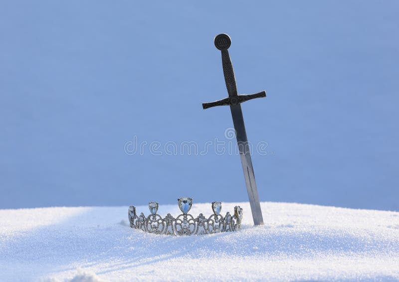 Crown and sword in snow stock image. Image of jewellery - 295742567