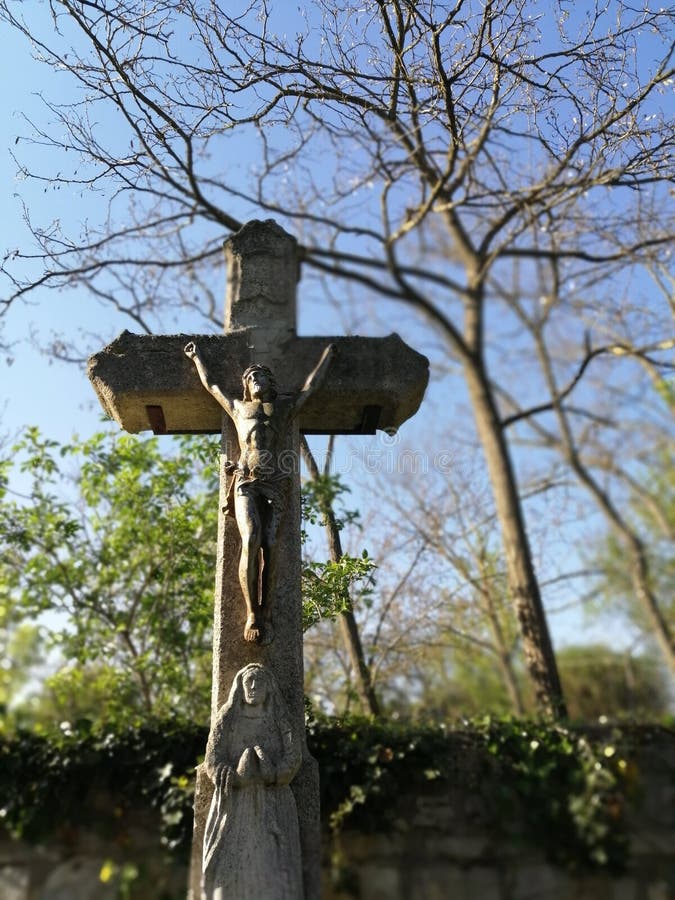 Crucifix in the graveyard stock photo. Image of cross - 146591126