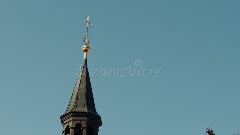 Crucifix Stands Tall on the Bell Tower Stock Video - Video of prague ...