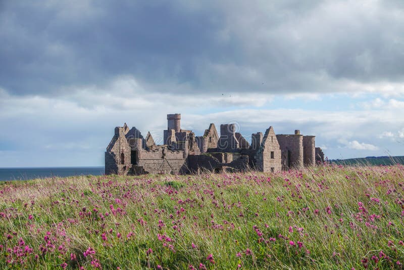 Crudden Bay with Slains Castle Ruins Stock Image - Image of rocks ...