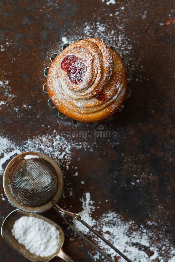 Cruffin with Raspberry Filling on a Dark Table Stock Photo - Image of ...