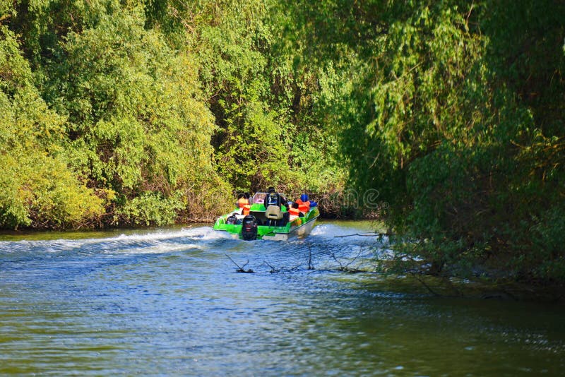 Cruise boat speeding editorial stock photo. Image of growing - 53940953