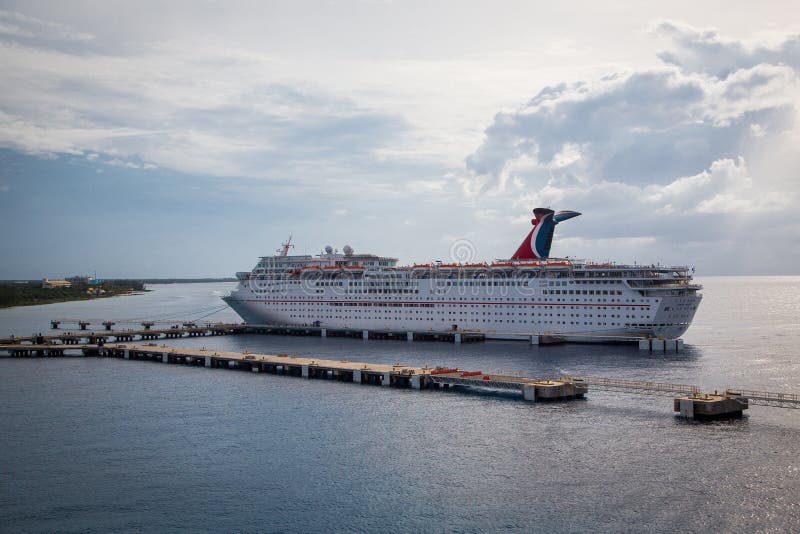 Cruise Ship Anchored at the Dock Editorial Photo - Image of dock, ropes ...