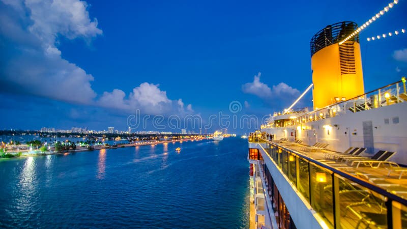 A Cruise Ship Arriving in the City at Night Stock Image - Image of boat ...