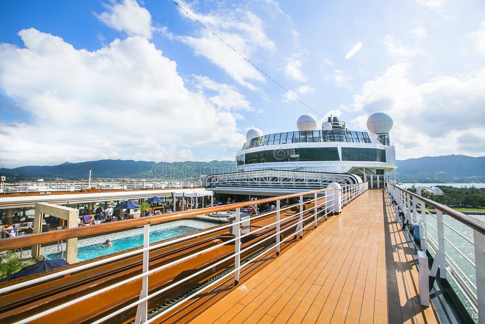 Cruise Ship. Tourists Relax and Take a Sun Bath on the Upper Dec Stock ...