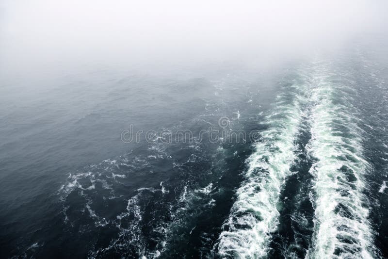 Ship wake at sunset stock photo. Image of sunset, water - 22692630