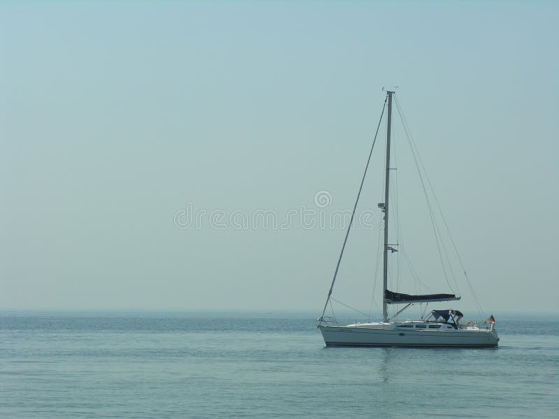 Cruising stock photo. Image of yacht, water, haze, lake - 2550482