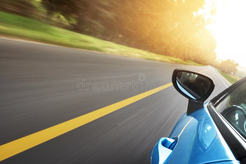 Cruising the Open Road. Shot of a Car Driving on a Road. Stock Photo ...