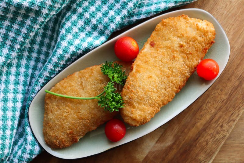 Crumbed hake fillets stock image. Image of salad, hake - 248073081