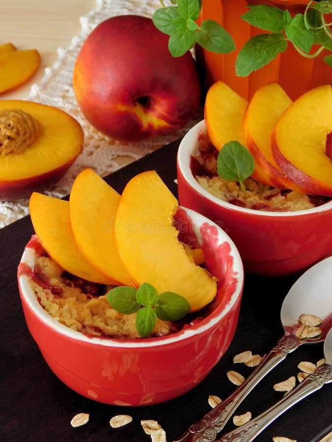 Crumble Dessert Decorated with Fresh Nectarines Stock Image - Image of ...