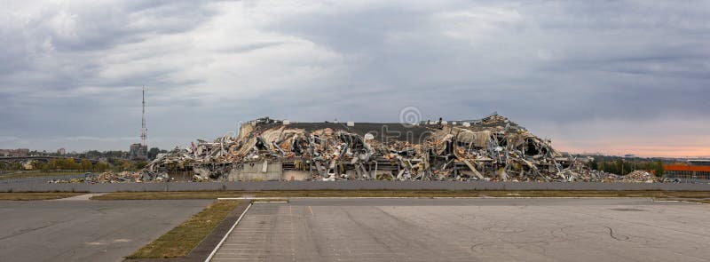 Crumbled Concrete Building with Piles of Debris. Panoramic Photo Shot ...