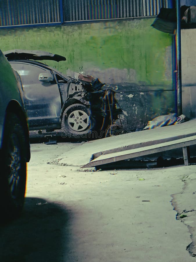 Crumple car in the garage stock image. Image of wheels - 263529195
