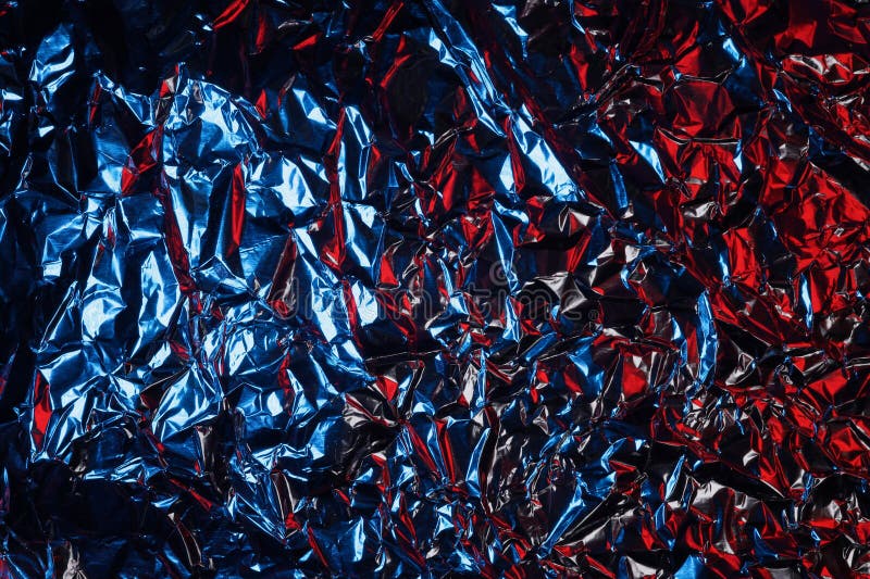 Crumpled Aluminum Foil in Red and Blue Light, Background or Texture ...