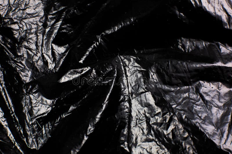 Crumpled Black Plastic Bag Texture Background. Glossy Polyethylene ...