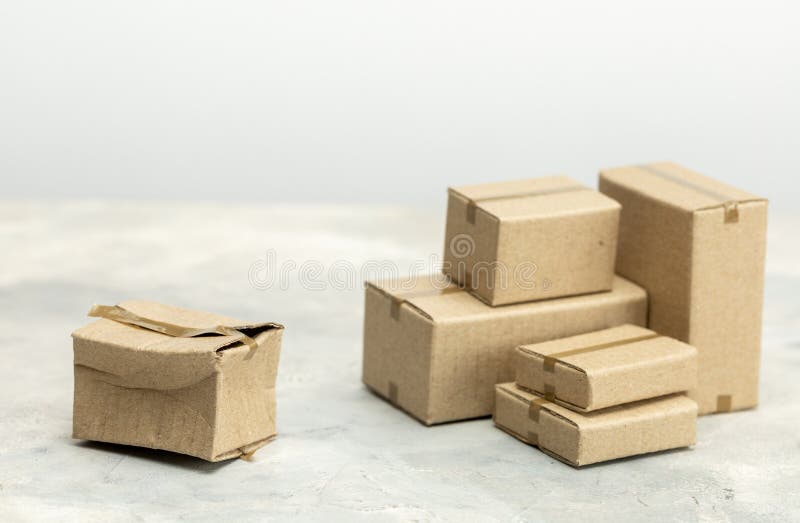 Crumpled and Broken Box and Whole Cardboard Boxes Stock Image - Image ...