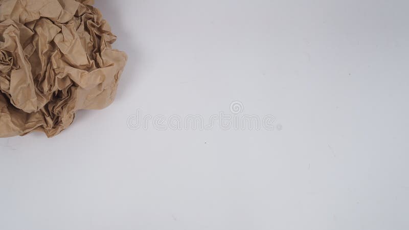 Crumpled Brown Paper.it is Mauled on Blue Background Stock Photo ...