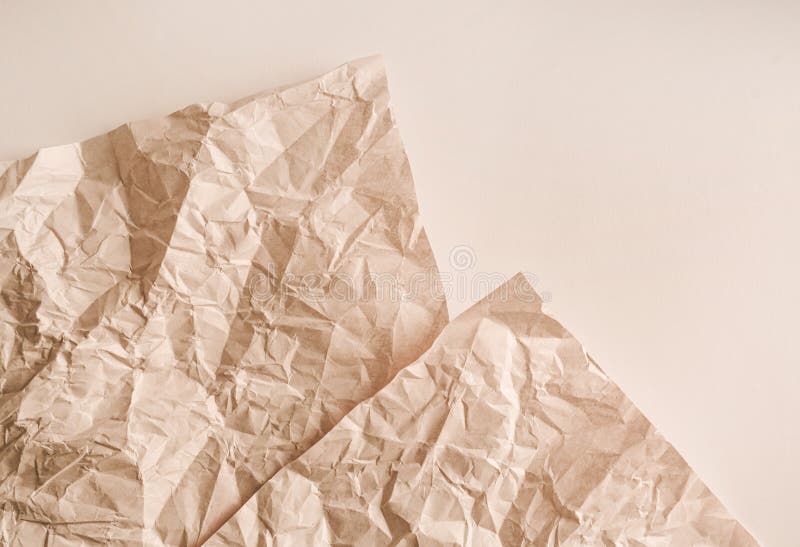 Crumpled Brown Paper Sheets Arranged on a Light Backdrop in a ...