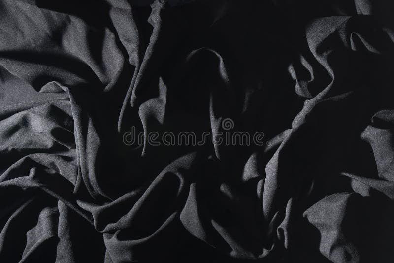Crumpled cloth in black stock image. Image of decoration - 170914399